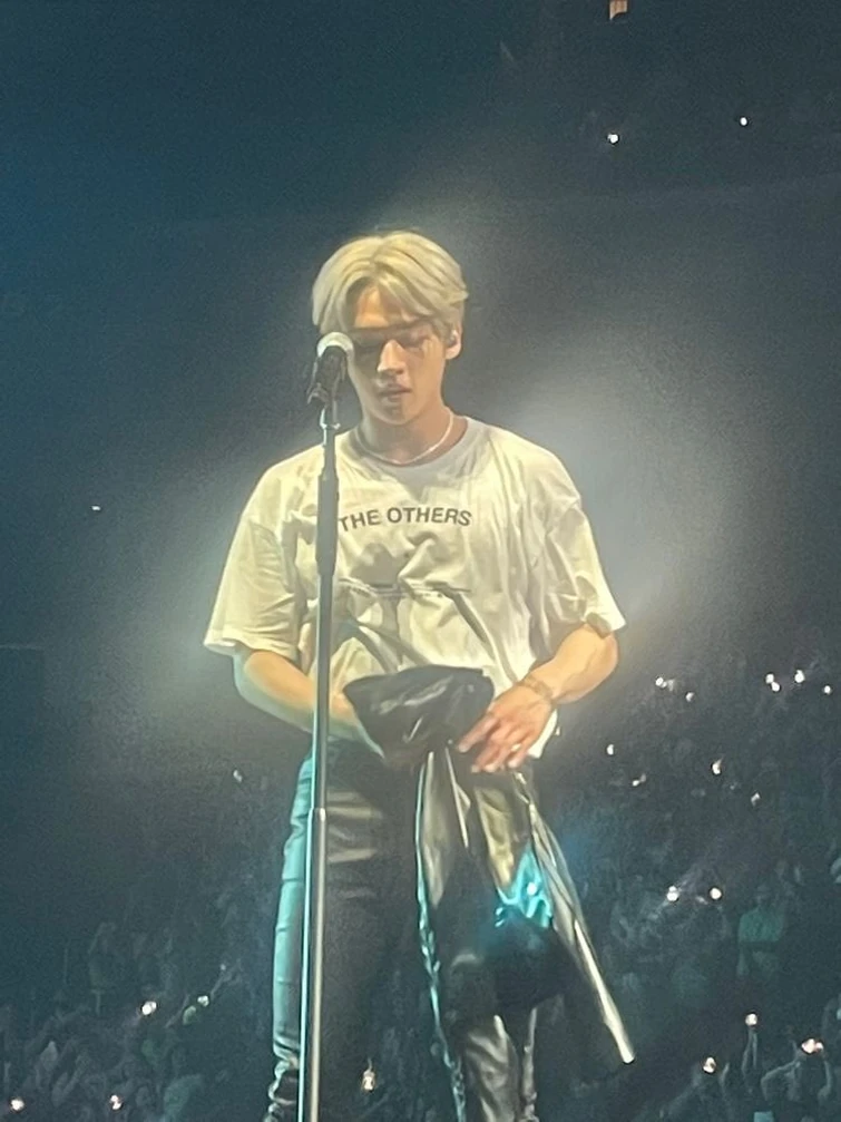 i found this pic of minho during one of their concerts from the recent ...