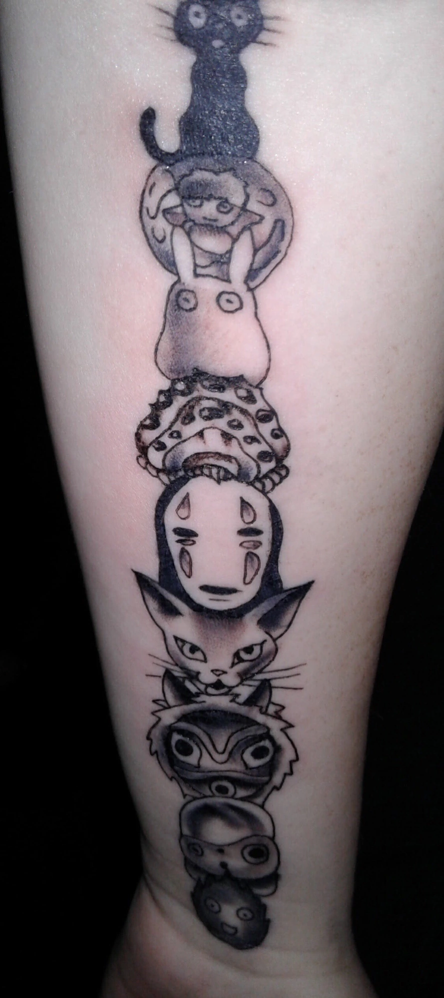 My ghibli tattoo that I loveeee. It needs a touch up now at almost 3 ...
