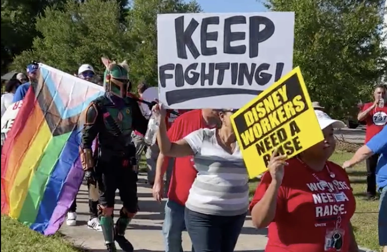 Walt Disney World Workers Picket Outside Park Facilities Flying LGBT ...