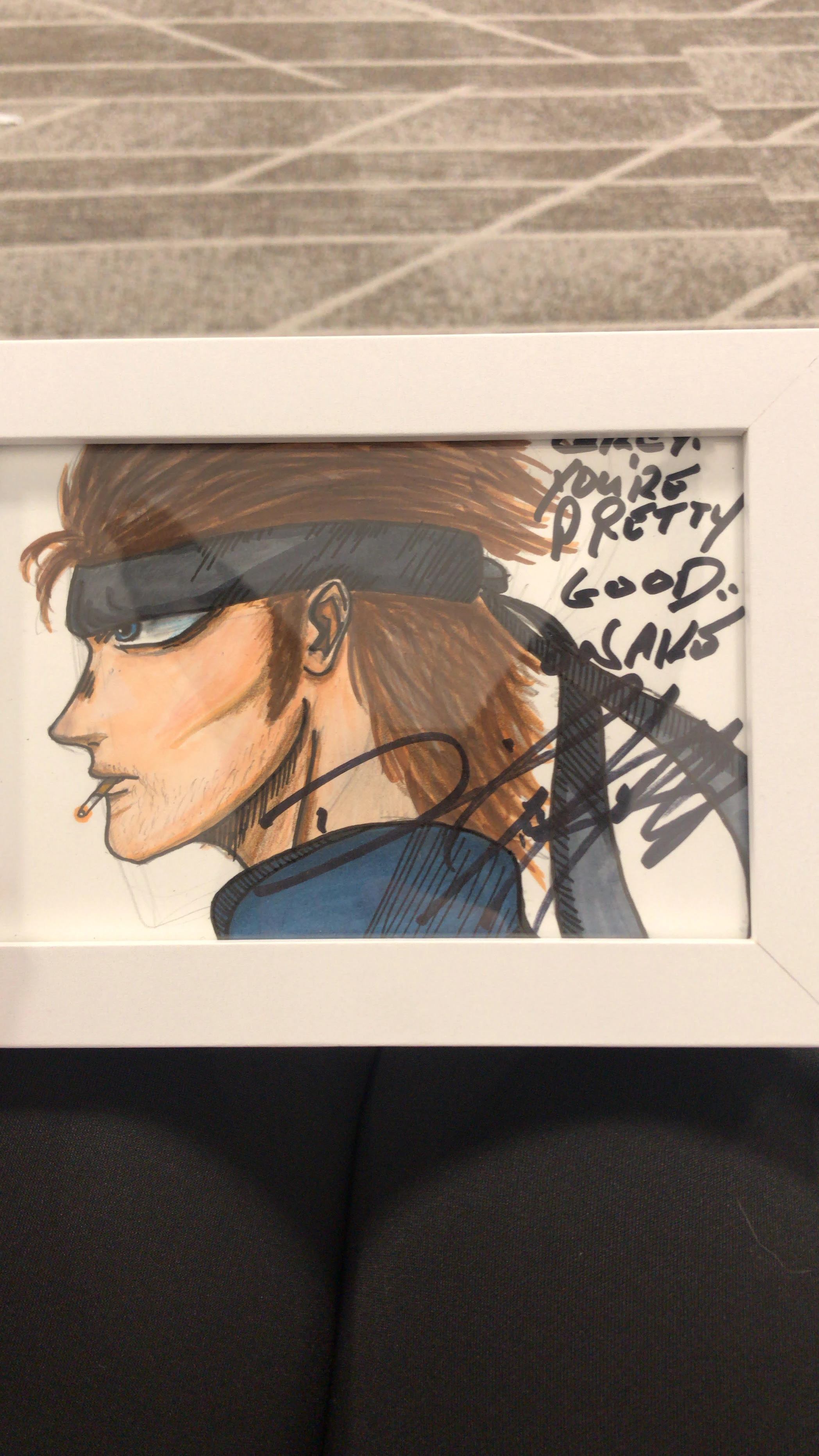 David Hayter was a guest at my local Comic-Con, so I got my Solid Snake drawing signed by him ...