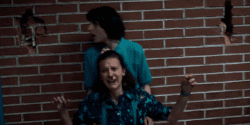 El falls into Mikes arms after fighting off Billy | Fun Fact: | Fandom