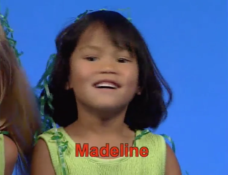 Look very carefully at someone on the left next to Madeline Pluto. Do ...