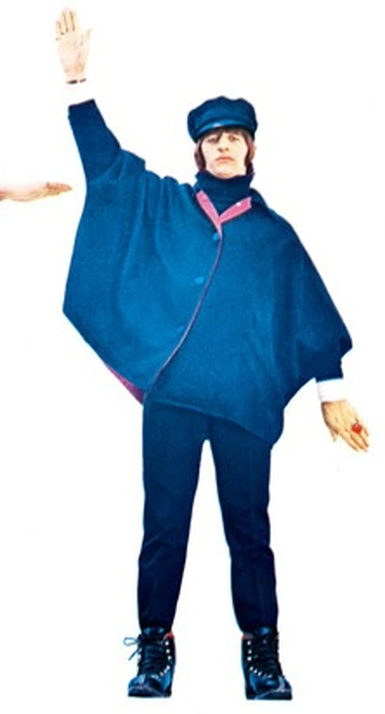 Not gonna lie, Ringo Starr looks like he has an engine driver uniform ...