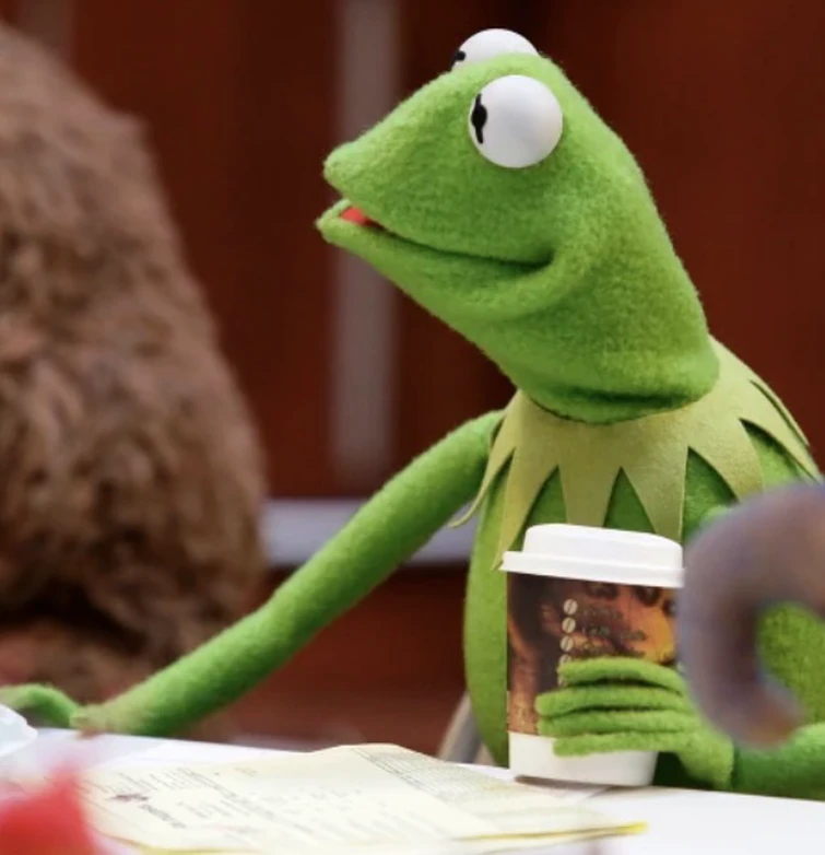 Kermit holding a coffee | Fandom