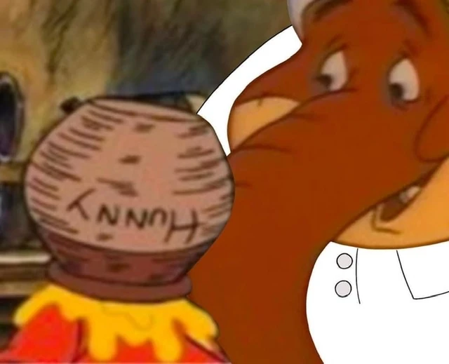 While Pooh with a honeypot stuck on his head, with Heff right next to ...