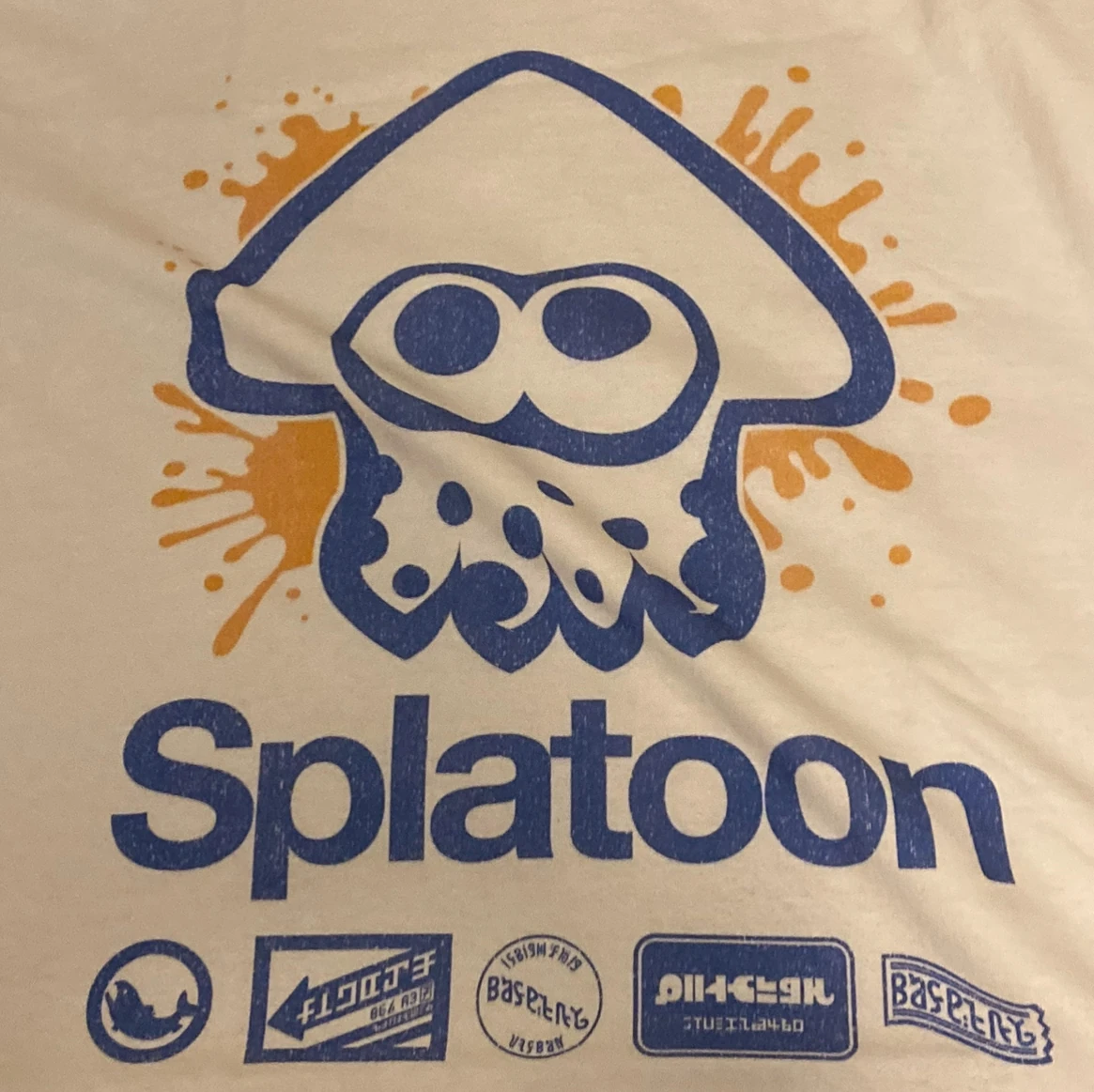 What are the symbols on this splatoon shirt I have? | Fandom