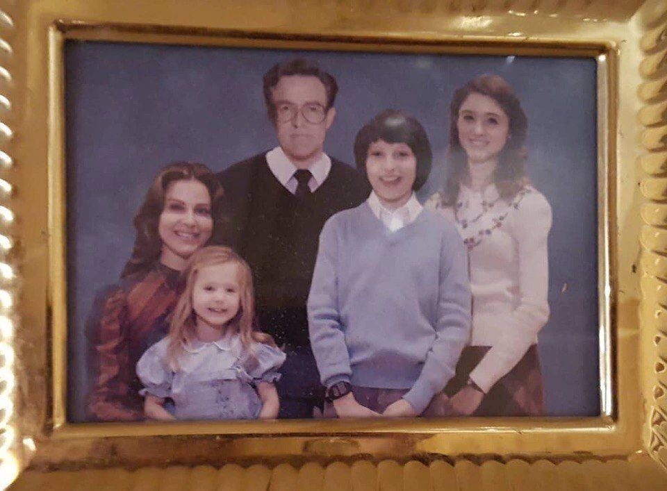Why isn't Ted smiling like the rest of the family? | Fandom