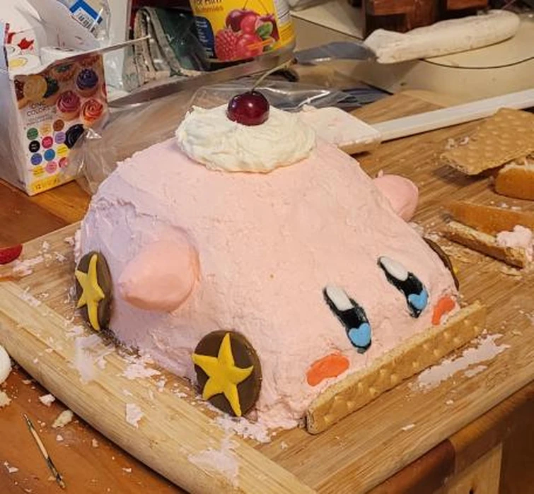 This really cool Kirby cake one of my friends on Discord made for her ...