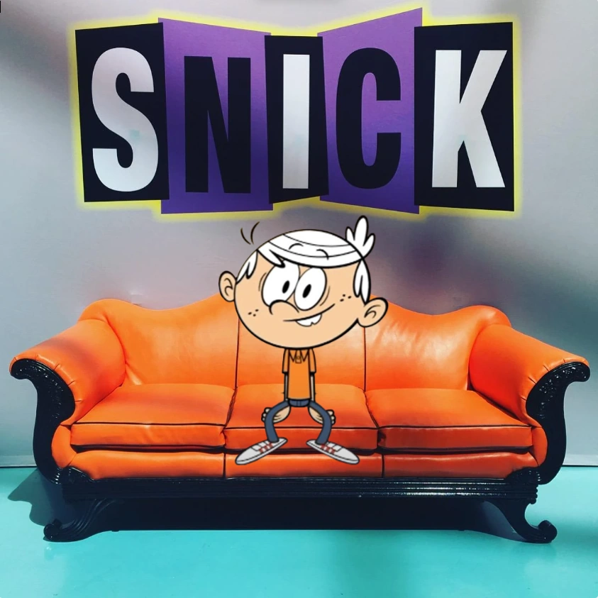 Lincoln Loud sitting on the Big Orange Couch during SNICK. | Fandom