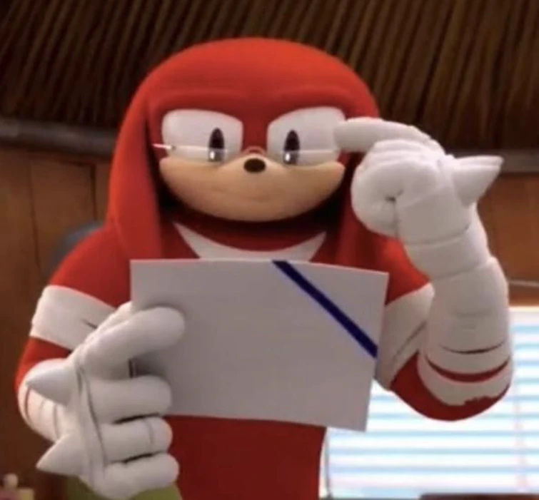 Knuckles takes paper, stares, pulls out READING glasses, stares ...