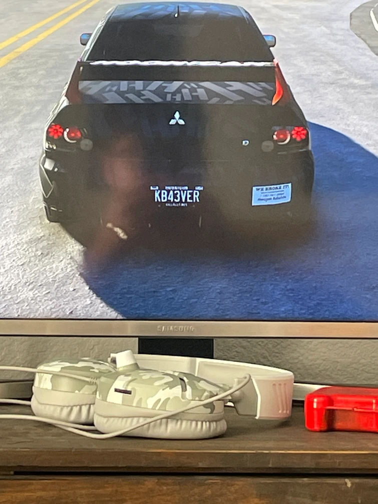 I just realized that the Hoonigan Mitsubishi Evo has the license plate ...