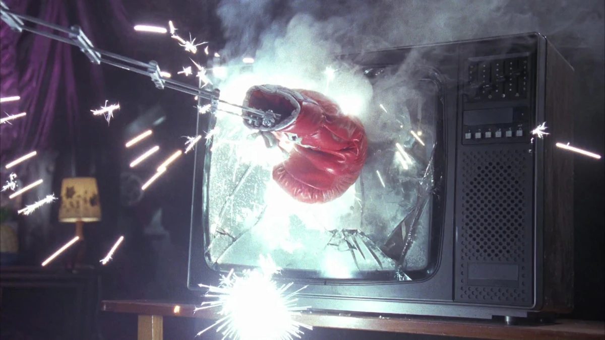 Telescopic Boxing Glove | Batman Wiki | Fandom