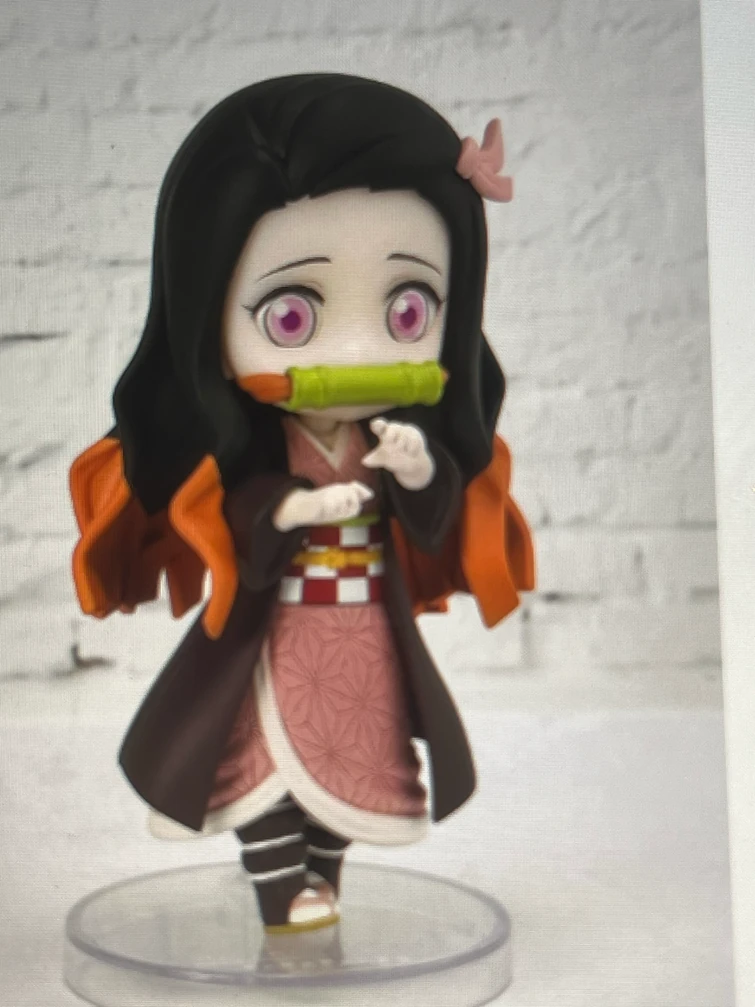 Nezuko on a figurine stand | Fandom