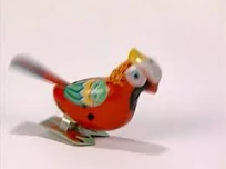 Tin Wind-Up Hopping Parrot | Best Baby Einstein Wiki | Fandom