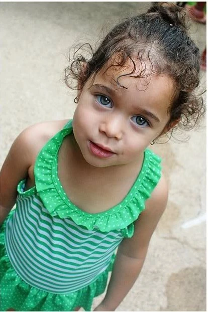 Hispanic Girl With Blue Eyes