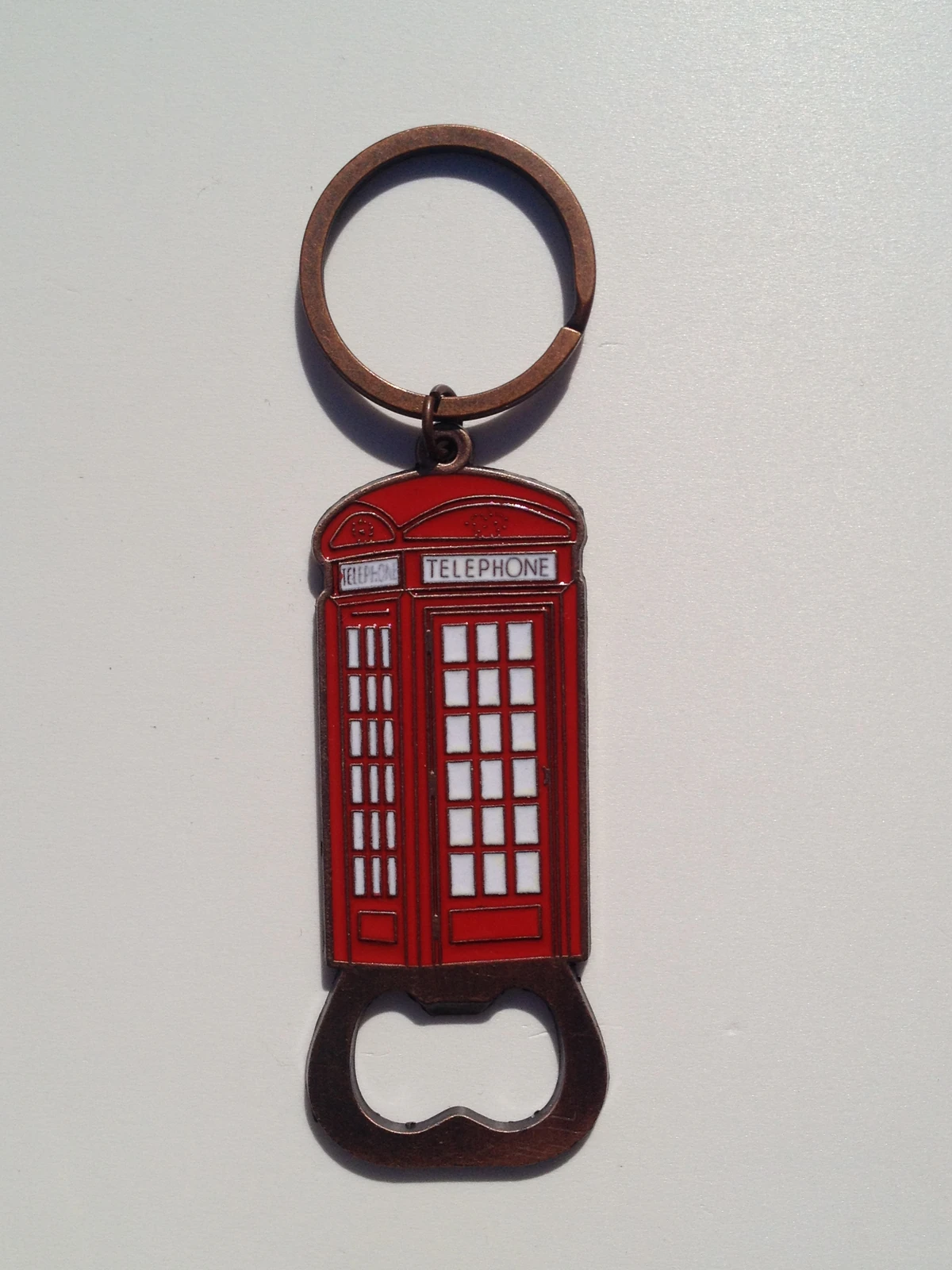 Red telephone box shaped metal souvenir opener | Bottle Openers Wiki ...