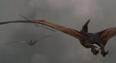You throw rocks at the raptors and Pteranodons. One Pteranodon gets mad ...