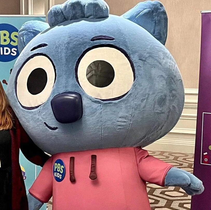 Malik Wombat | Costumed Characters Wiki | Fandom