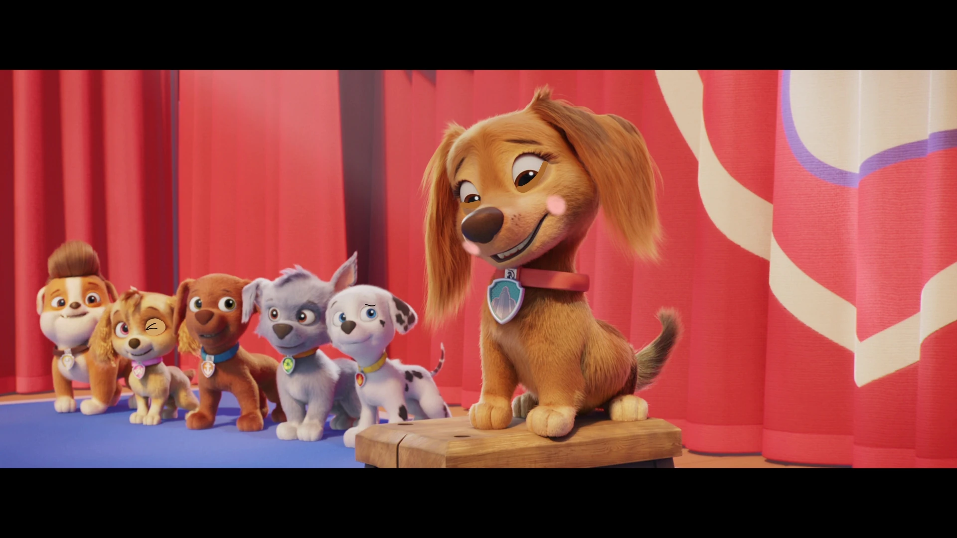 Liberty looking at her badge | Fandom