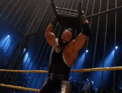 Macho Man Randy Savage Elbow Drop Gif