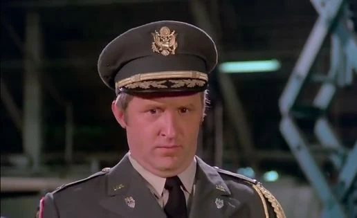 Colonel Woodruff | Wickedpedia | Fandom