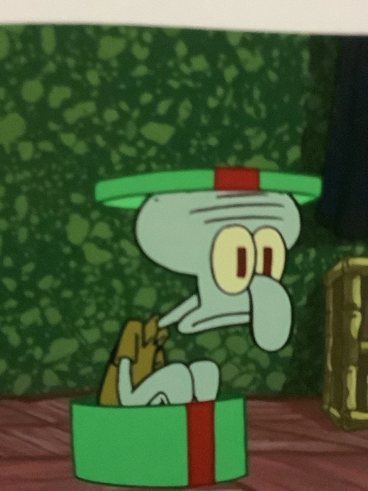 Squidward in a green present | Fandom