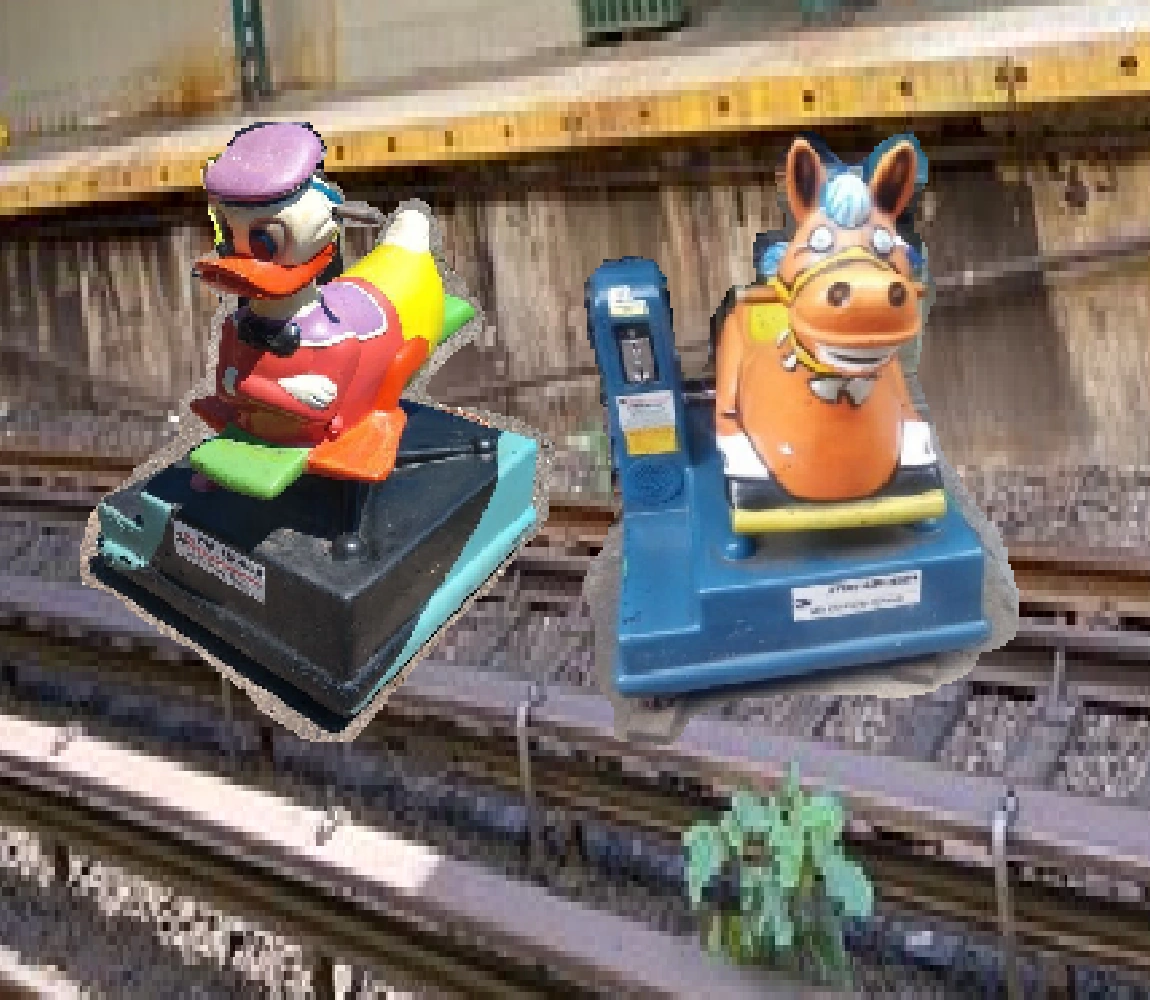 Coin operated kiddie ride - White duck (Donald Duck) and Orange horsey ...