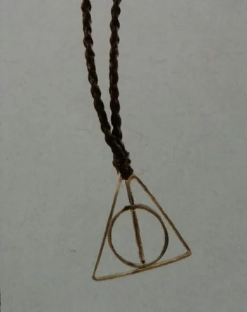 Gellert Grindelwald's Deathly Hallows necklace | Harry Potter Wiki | Fandom