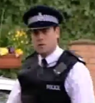 Policeman (Nicholas Saich) | Hollyoaks Wiki | Fandom
