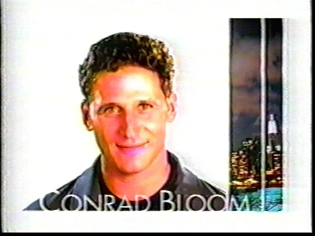 Conrad Bloom | Logopedia | Fandom
