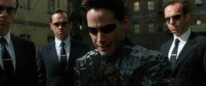 Neo as Smith attempts to assimilate him