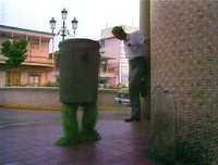 Oscar walking with his trash can | Muppet Wiki | Fandom