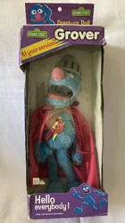 Dress-up Doll Grover | Muppet Wiki | Fandom