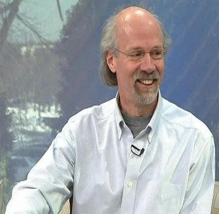 Announcer John Harvey