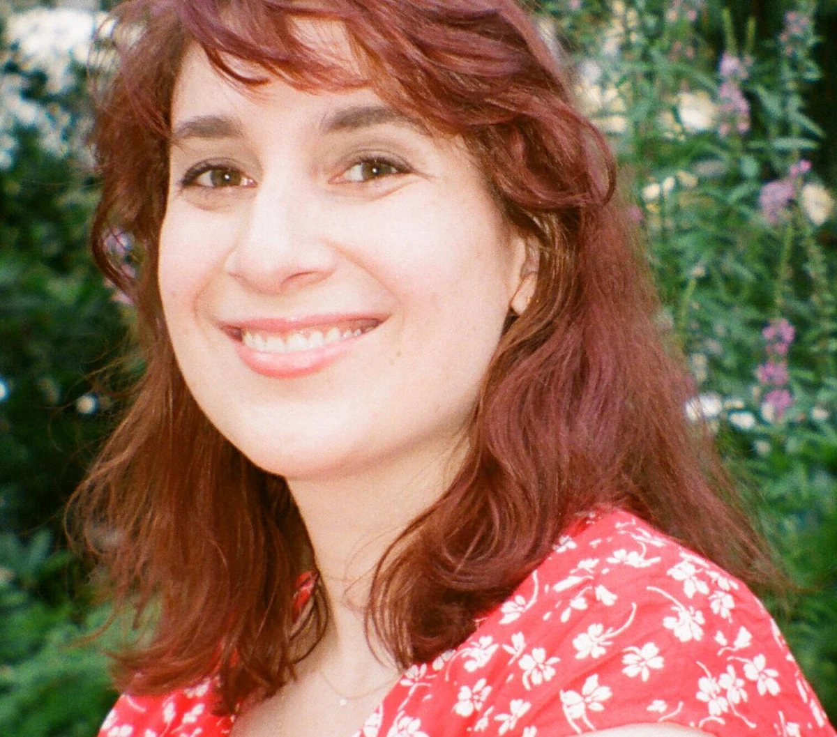 Lizzie Logan | Podcast Like It's 1999 Wiki | Fandom