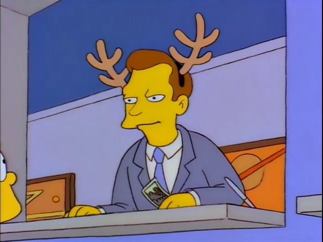 Banker with Antlers | Simpsons Wiki | Fandom