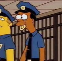 Officer with Badge in his Mouth | Simpsons Wiki | Fandom