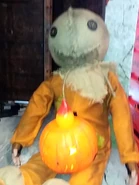 Sitting Sam Doll | Spirit Halloween Wikia | Fandom