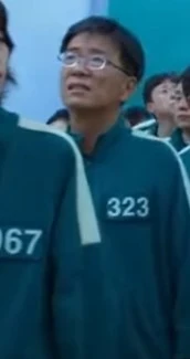 Player 323 | Squid Game Minor Players Wiki | Fandom