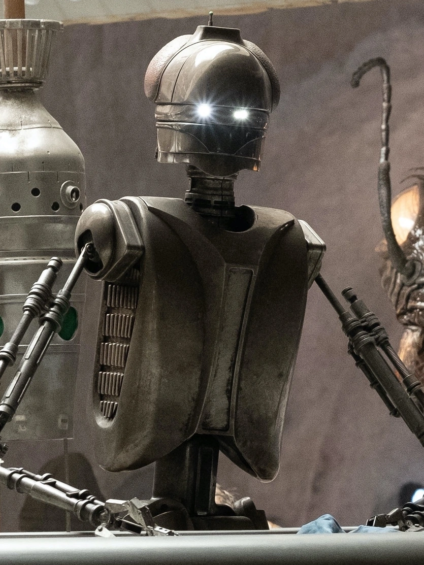 Unidentified Droid Bartender EV-9D9 | Star Wars Canon Wiki | Fandom