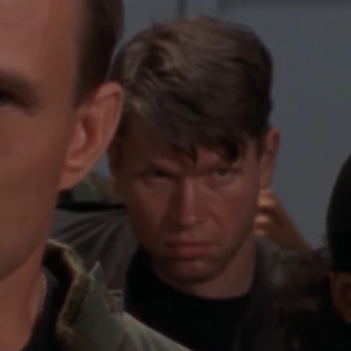 Zbuntowany Agent NID („Odcienie szarości”) | Stargate Polish Wiki | Fandom