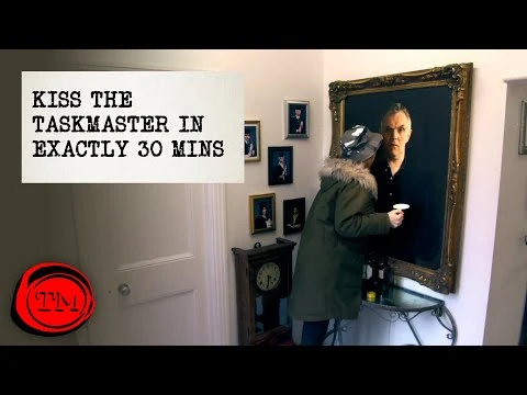 Wearing a hat, kiss the portrait of the Taskmaster in the Taskmaster's ...