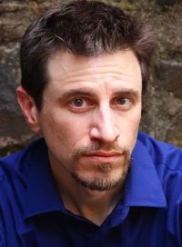 Tim Olcott | The Hunger Games Films Wikia | Fandom