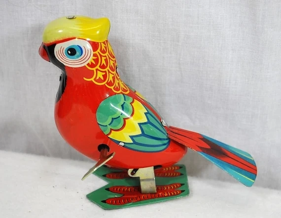 Tin Wind-Up Jumping Parrot | The Toy Chest Of Baby Einstein Wiki | Fandom
