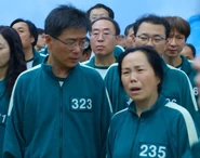 Player 323 | Squid Game Wiki | Fandom