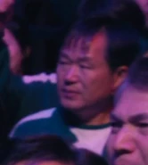 Player 411 | Squid Game Wiki | Fandom