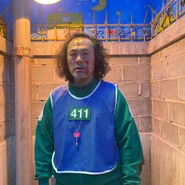 Player 411 | Squid Game Wiki | Fandom