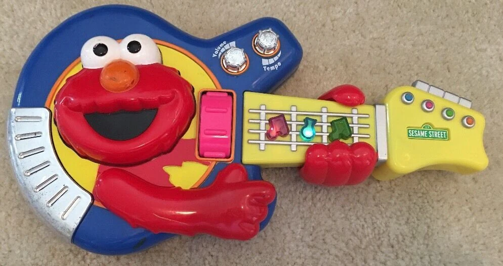 Jam with Elmo Guitar (2002) | Toys That Make Noise Wiki | Fandom