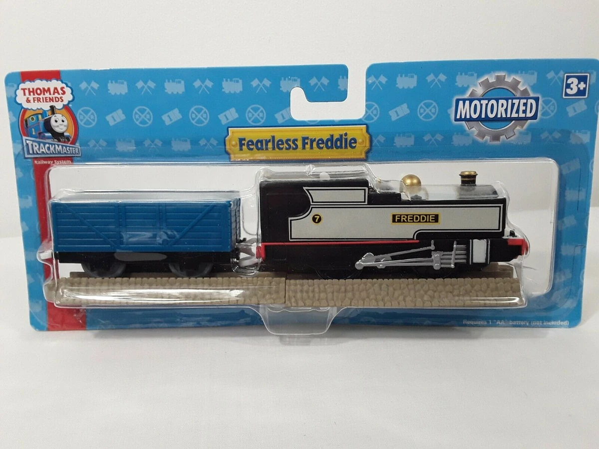 Freddie with Blue Truck and two half straight track pieces ...