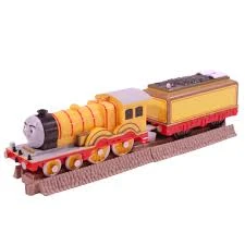 Molly with two half straight track pieces | TrackMaster Wiki | Fandom